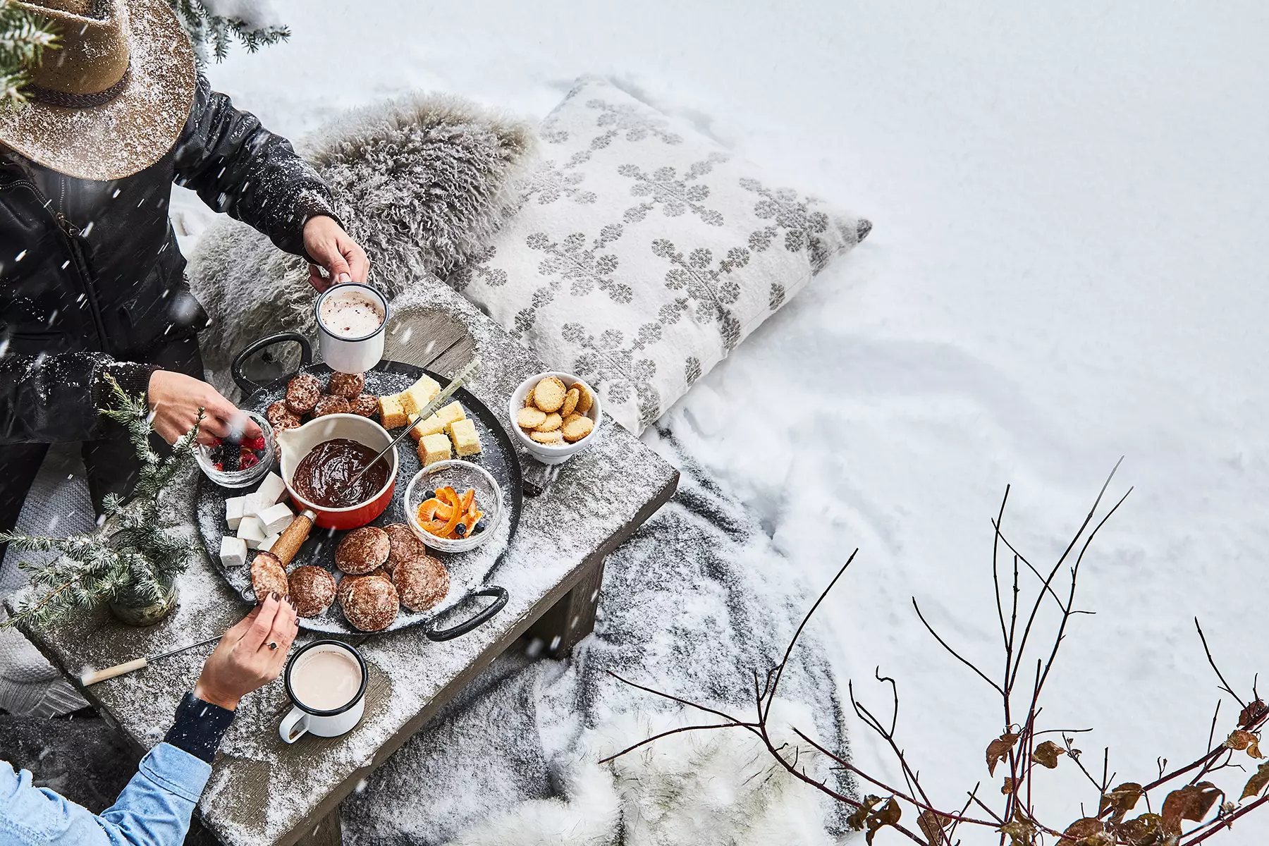 Tener fondu en la nieve en Goldener Hirsch