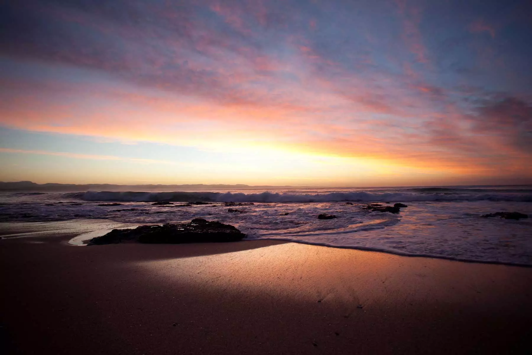 Amanecer na praia, Supertubes, Jefferys Bay, Sudáfrica