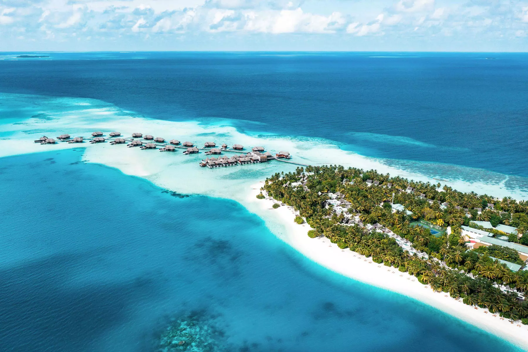 កោះ Conrad Maldives Rangali ទិដ្ឋភាពពីលើអាកាសកោះគ្រួសារនៅថ្ងៃដែលមានពន្លឺថ្ងៃ