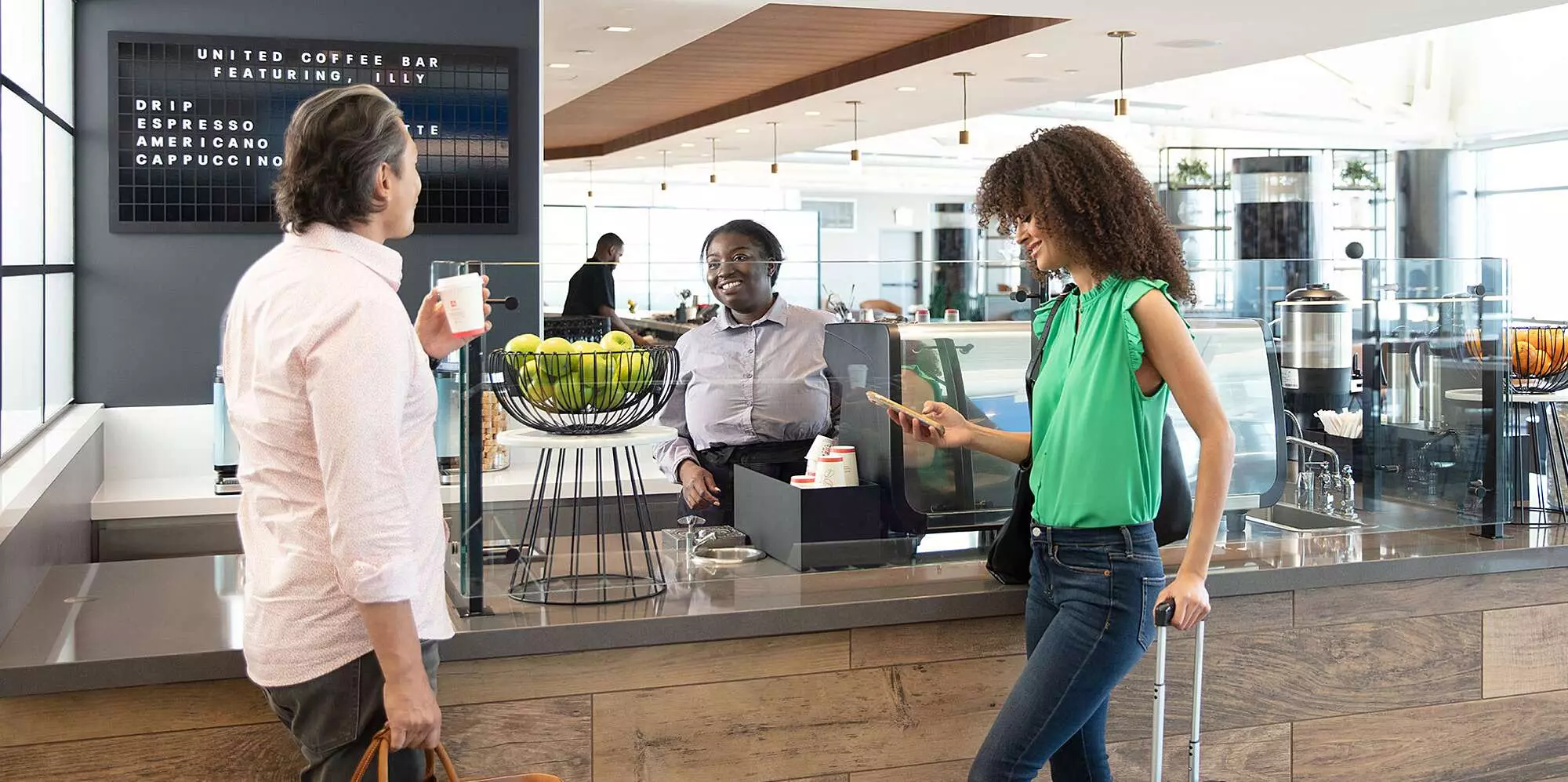 United Airlines har netop åbnet sin største amerikanske lounge - med en fantastisk udsigt over NYC skyline, spa-lignende brusere og baristaer på stedet