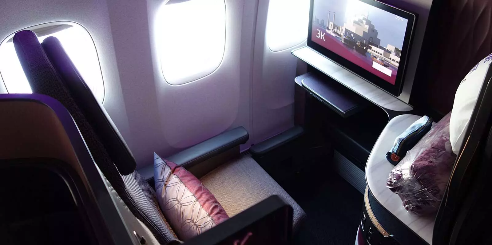 I Flew Qatar's Business Class Qsuites: در اینجا واقعاً چگونه بود