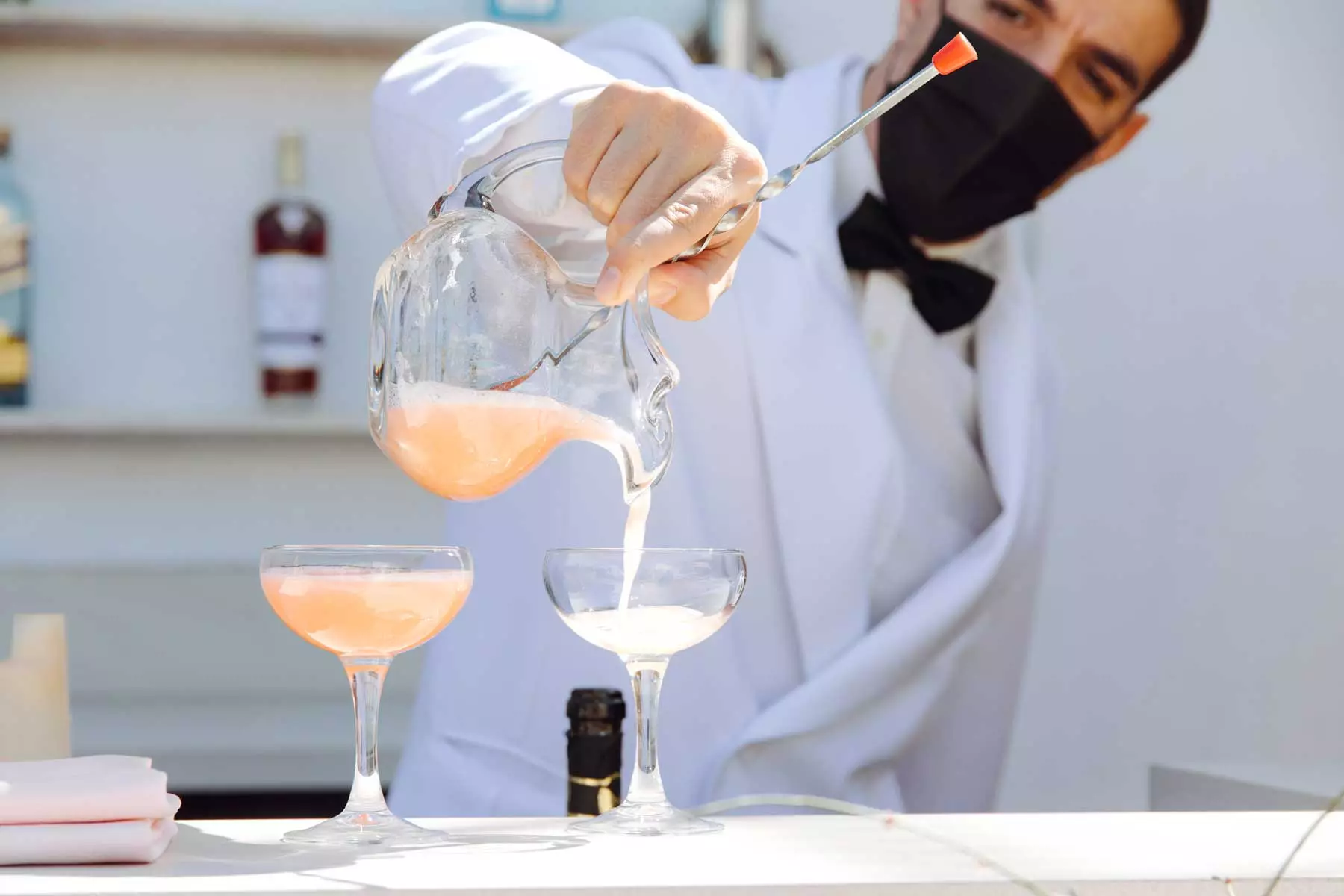 Bartender pouring Bellinis