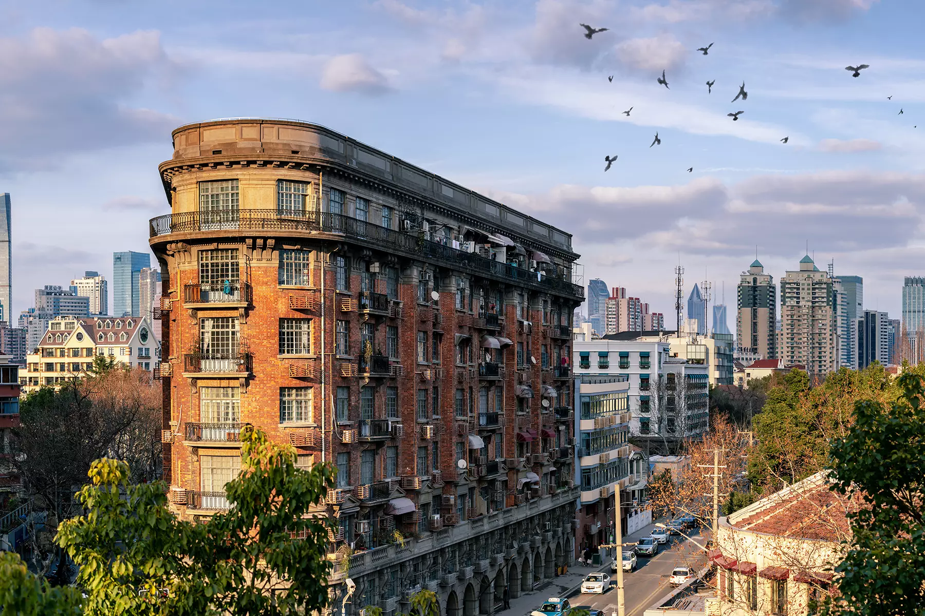 Sunset Huaihai Road (budynek Szanghaj Wukang)