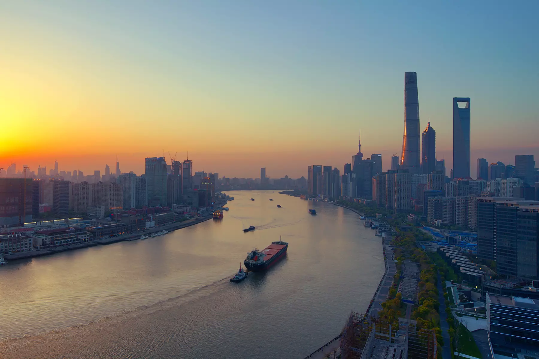 die sonsondergang van die Huangpu-rivier