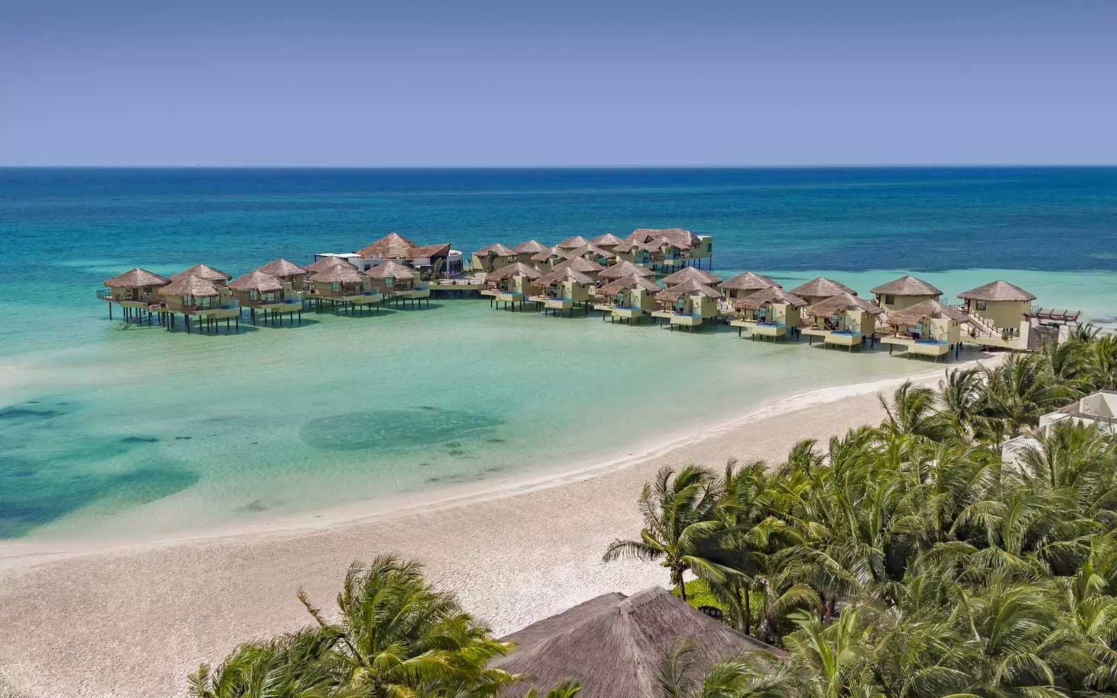 Ruwan ruwa Palafitos bungalows a wurin shakatawa na El Dorado Maroma a Mexico